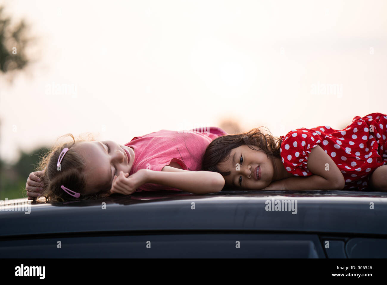 Girl laying car hi-res stock photography and images - Alamy