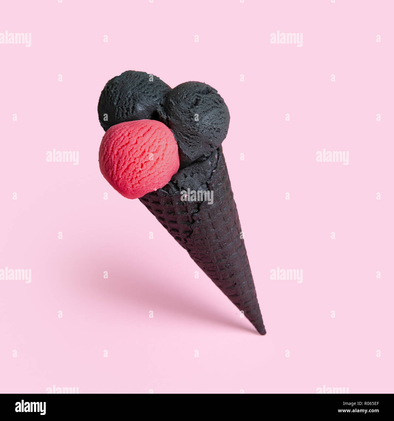 Creative layout - ice cream cones with black ice cream, top view Stock ...