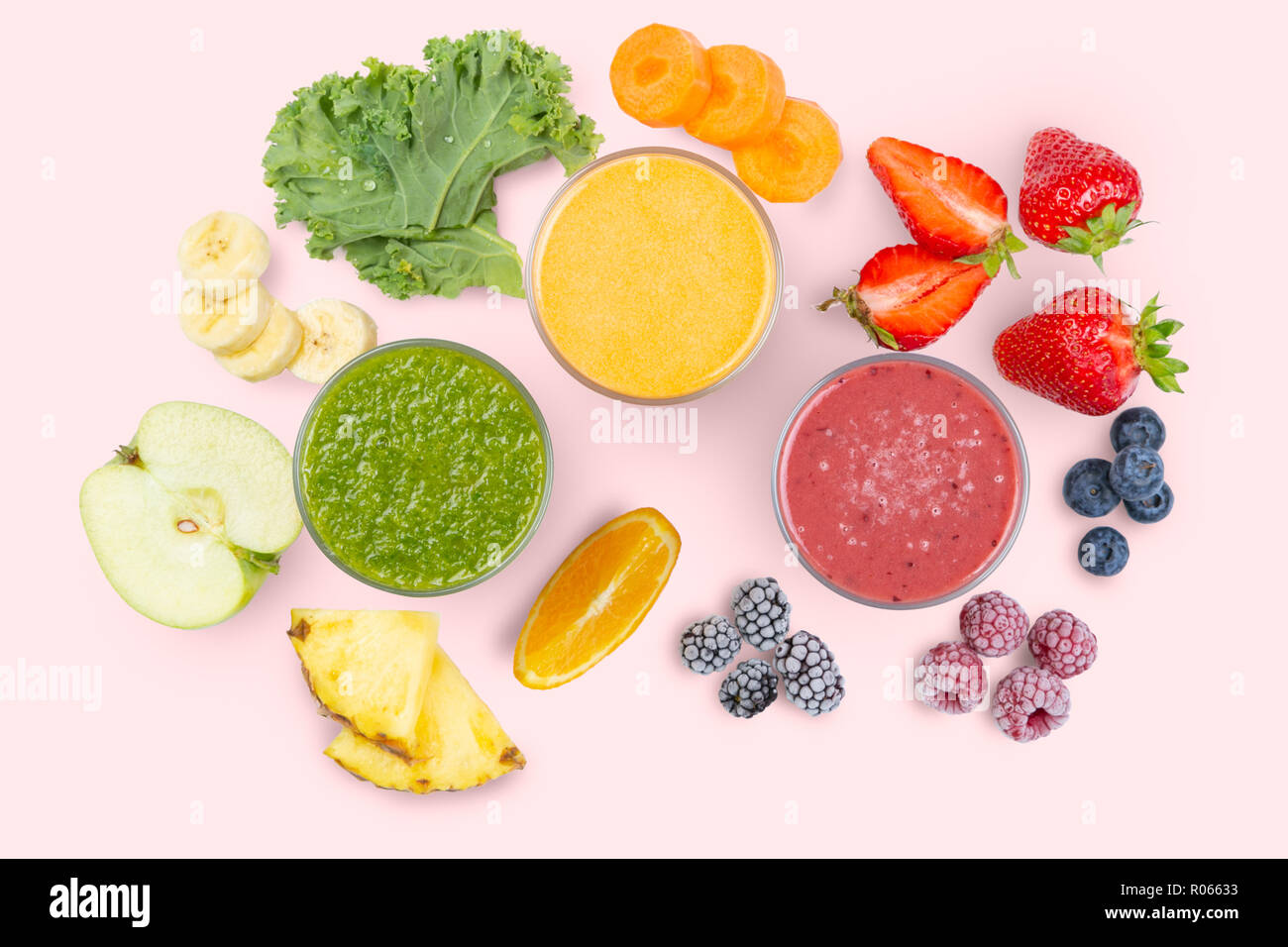 Creative layout of fresh smoothies with ingredients on pastel ...