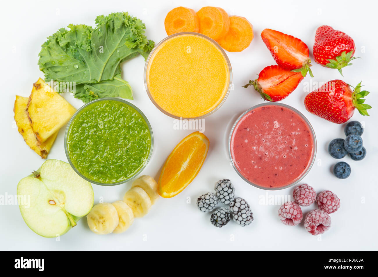 Creative layout of fresh smoothies with ingredients on white background ...