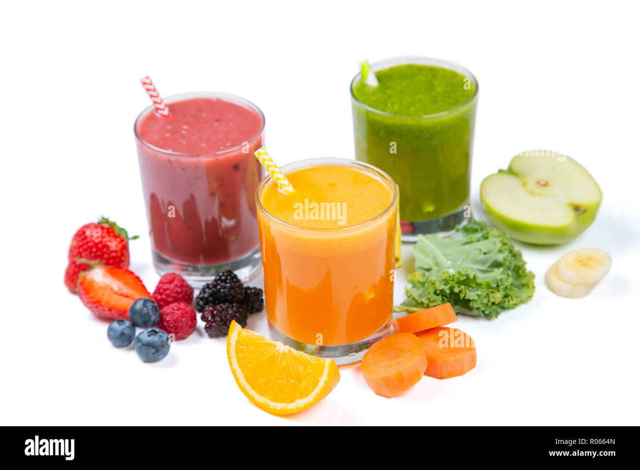 Creative layout of fresh smoothies with ingredients on white background ...