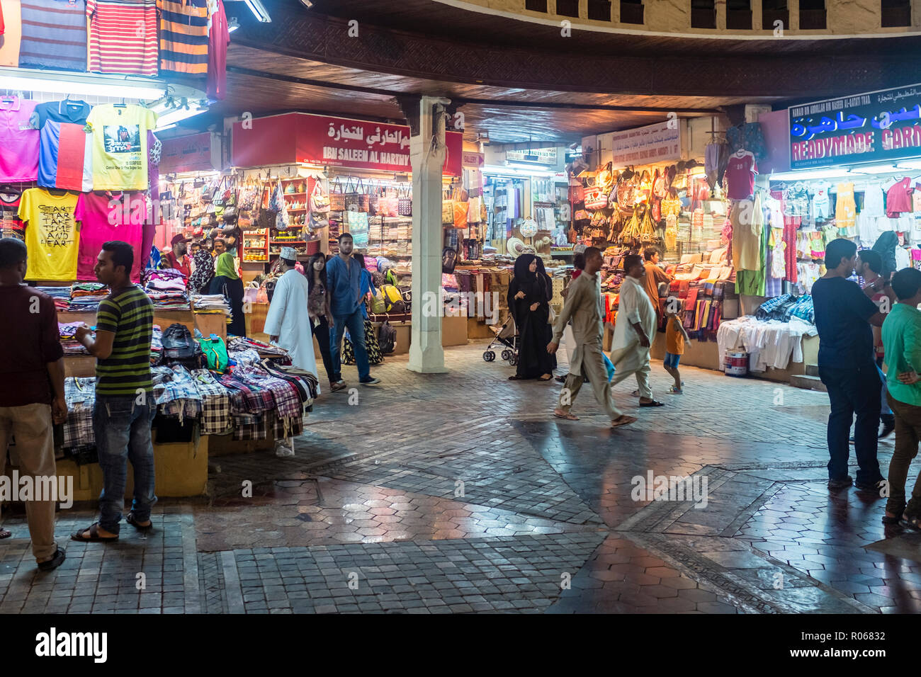 Shoppers at the souk at Muttrah Corniche, Muscat, Oman. This historic ...