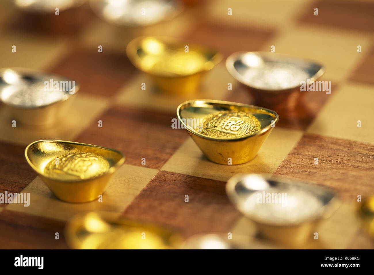 Gold ingot and silver treasure Stock Photo - Alamy