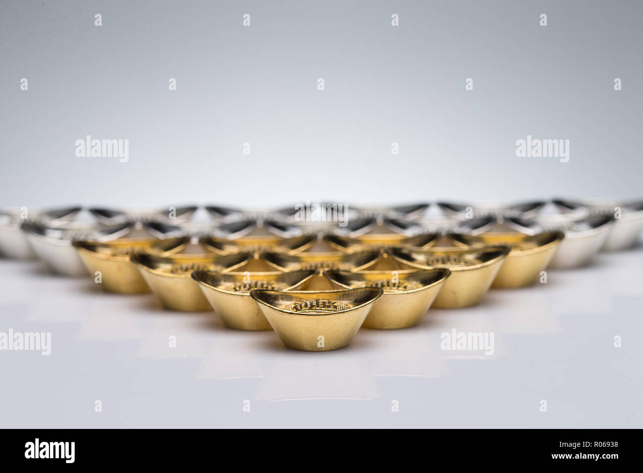 Gold ingot and silver treasure Stock Photo - Alamy