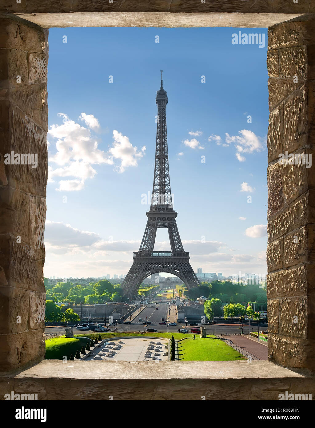 View on Eiffel Tower from ancient window Stock Photo - Alamy