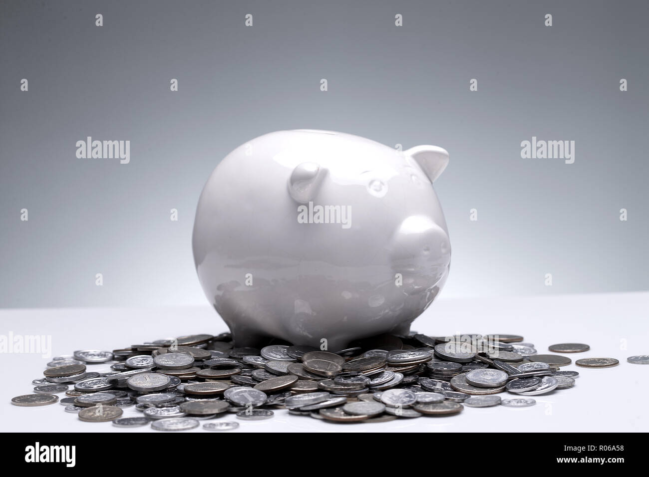 COINS and piggy bank Stock Photo - Alamy