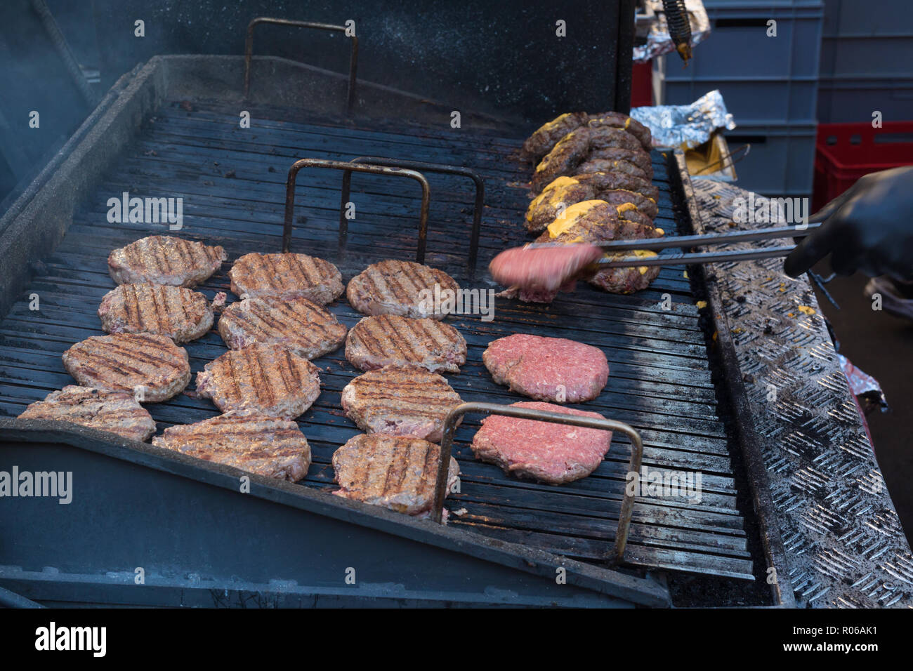 Chef making beef burgers outdoor on open kitchen international food ...