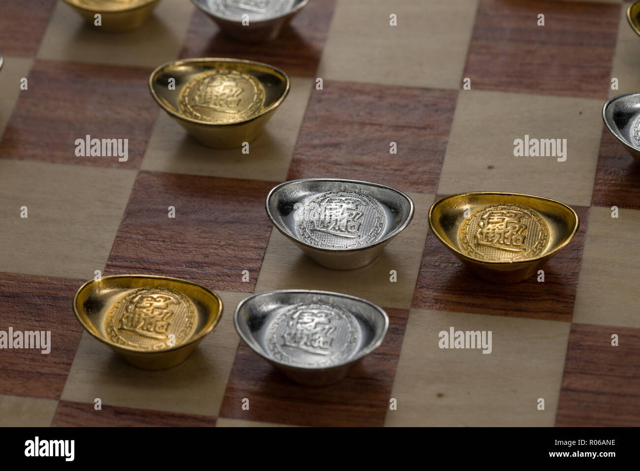 Gold ingot and silver treasure Stock Photo - Alamy