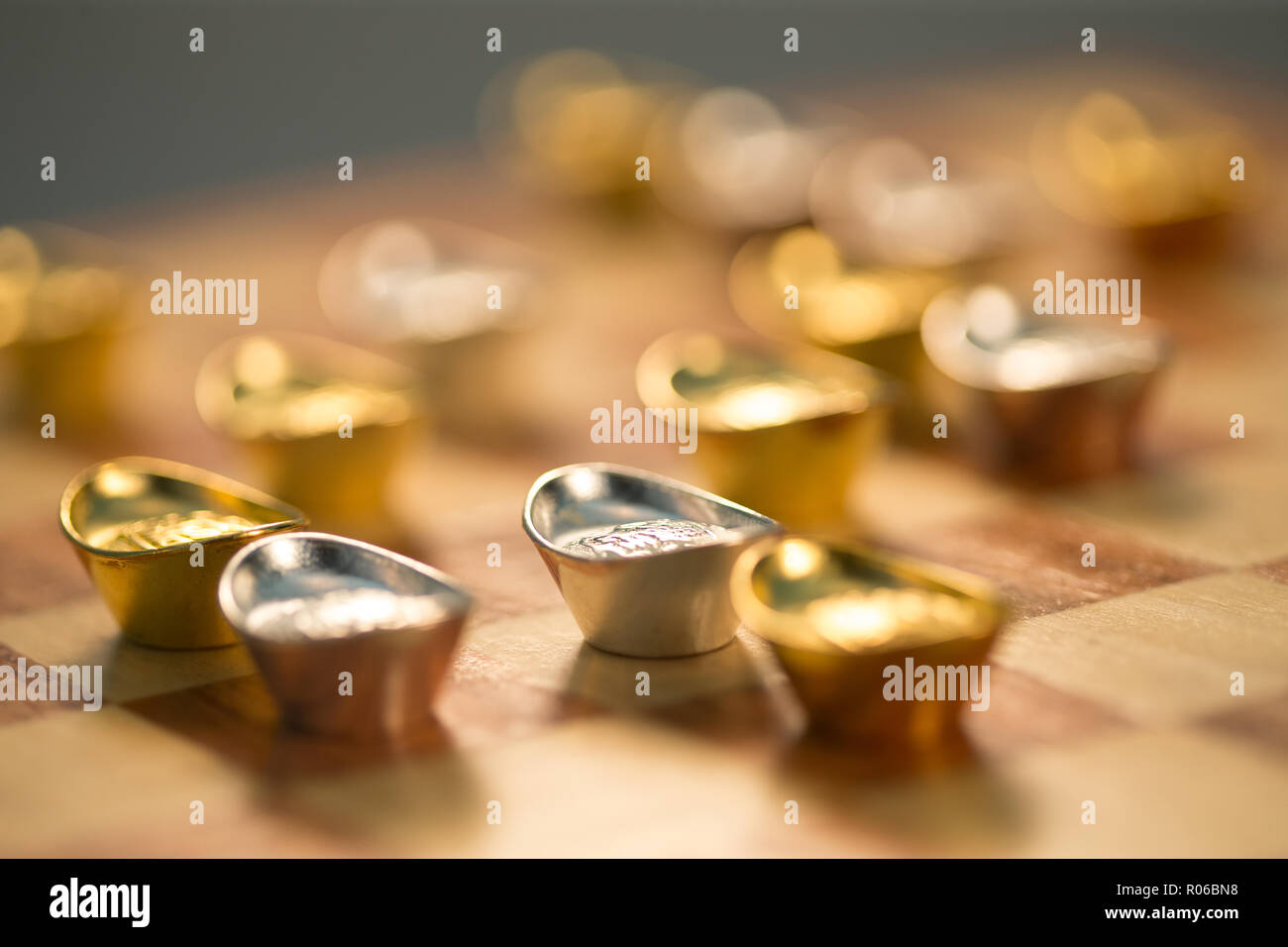 Gold ingot and silver treasure Stock Photo - Alamy