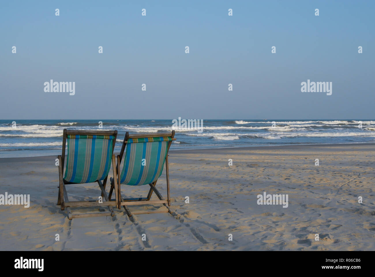 Two beach chairs on the beach Stock Photo - Alamy