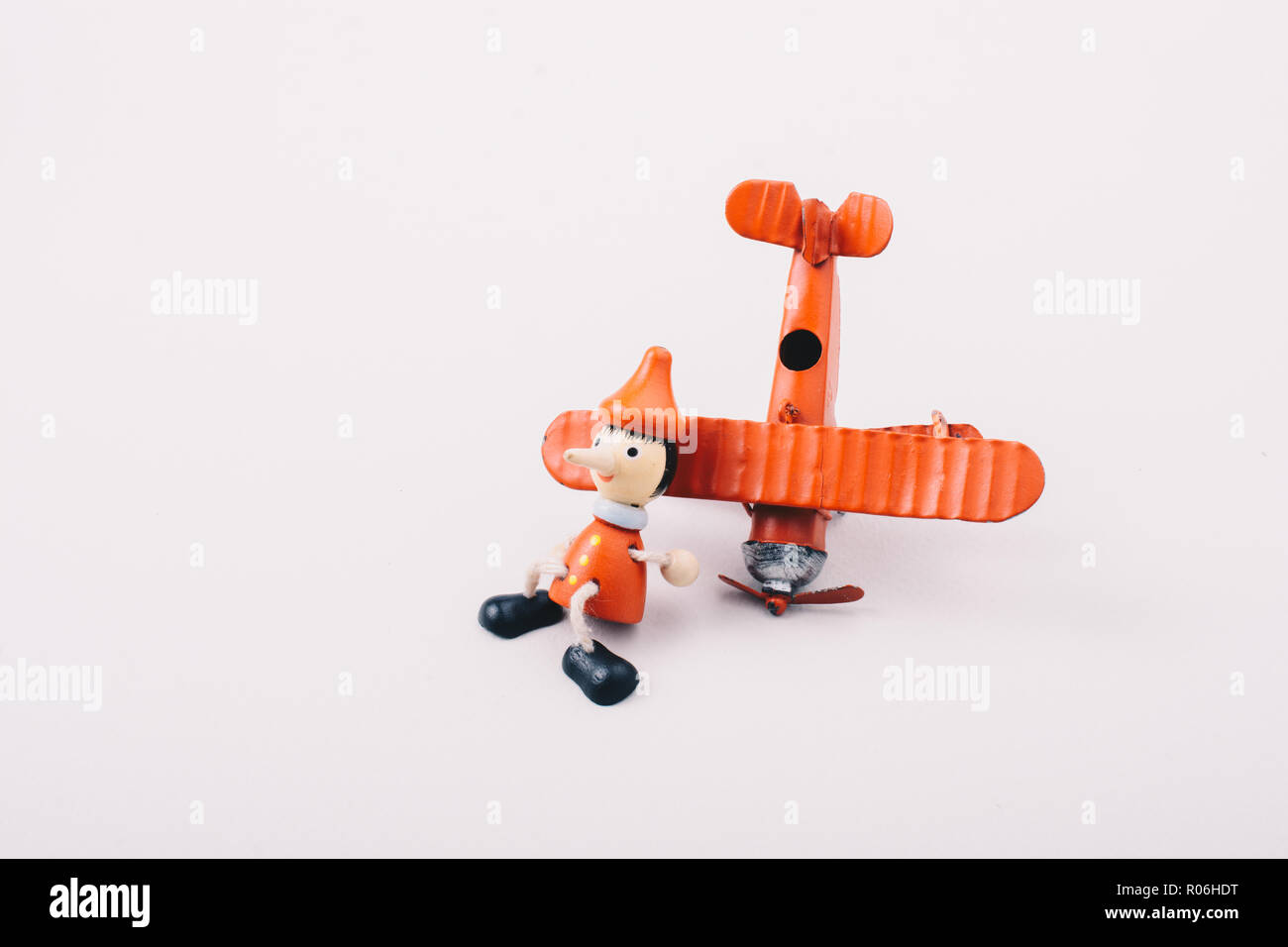 Airplane, Bullet and wooden pinocchio with his long nose Stock Photo ...