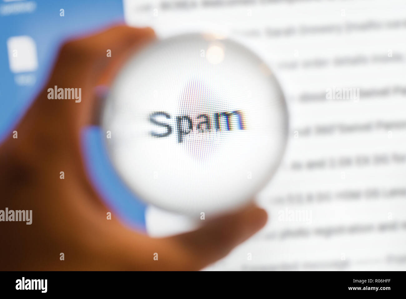 Crystal ball magnify word spam, email concept Stock Photo - Alamy