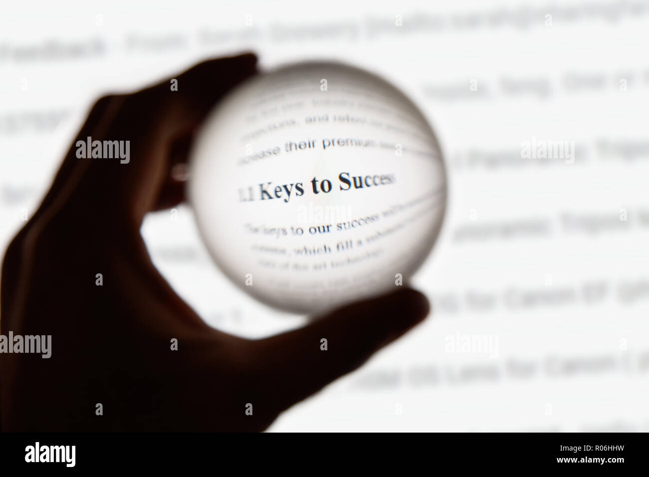 Crystal ball magnify computer screen word keys to success Stock Photo ...