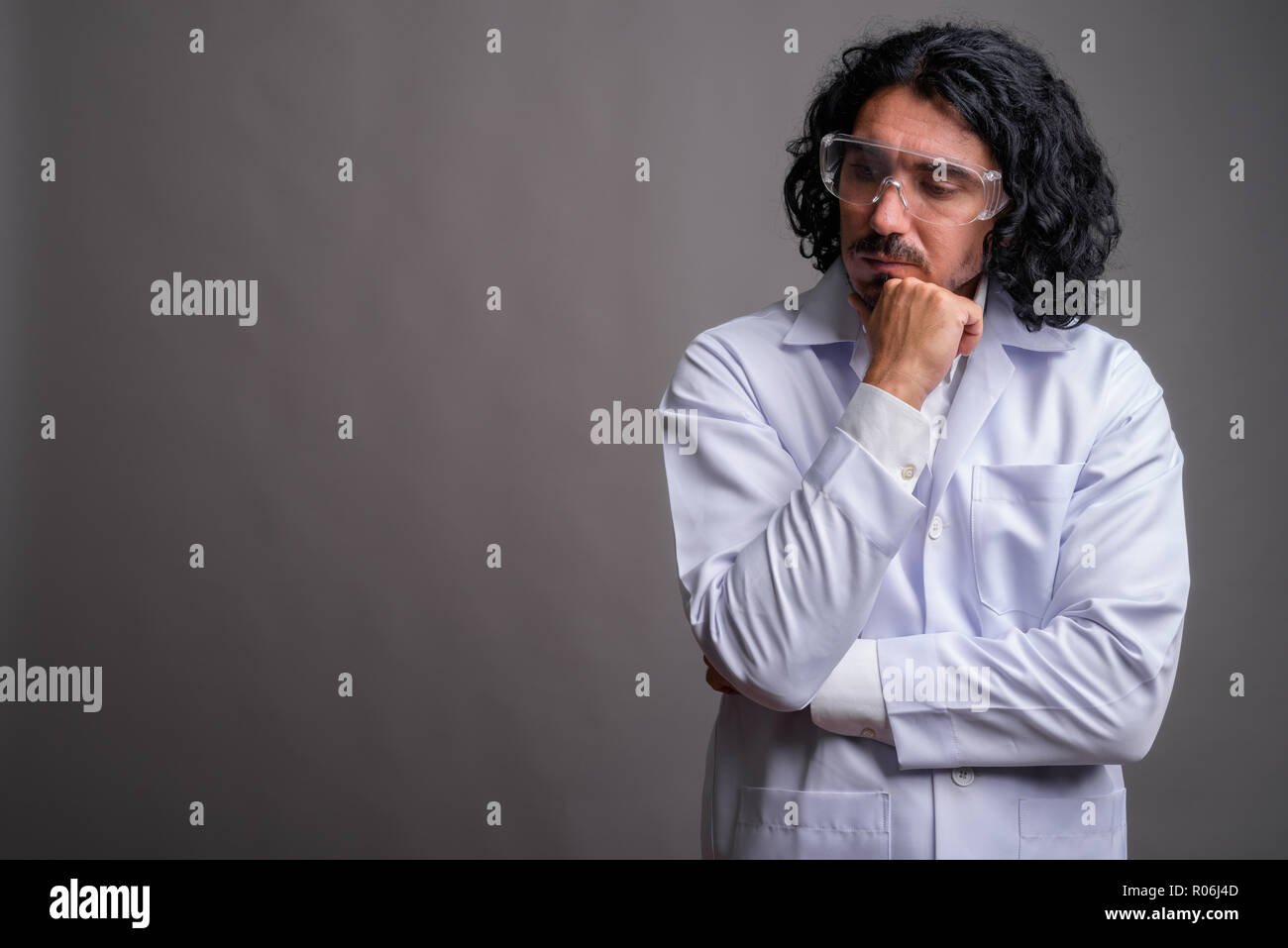 Scientist man doctor with mustache wearing protective glasses Stock ...