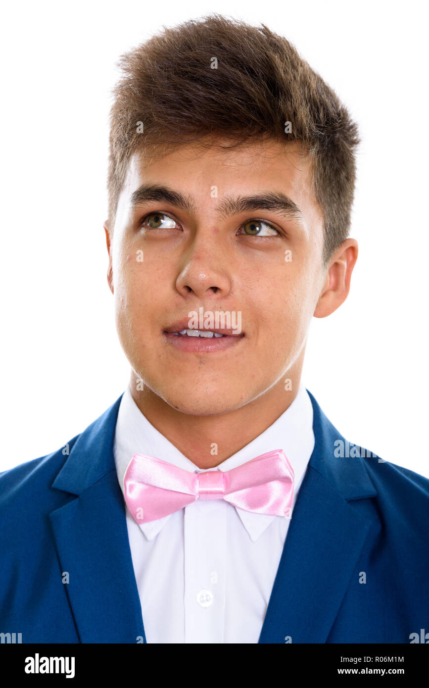 Face of young handsome man thinking while looking up Stock Photo - Alamy