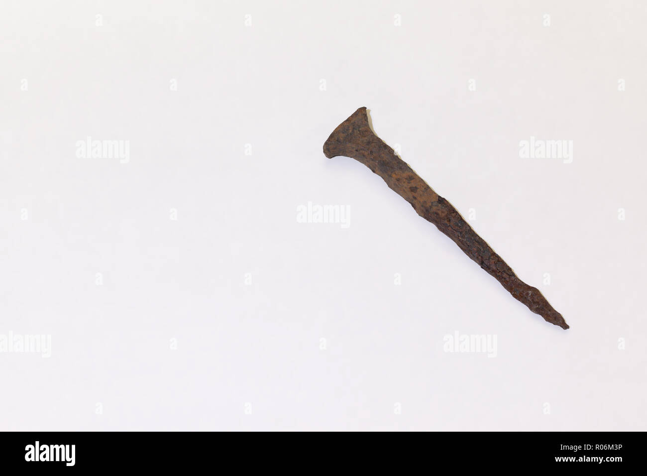 An old rusty railway spike Stock Photo - Alamy