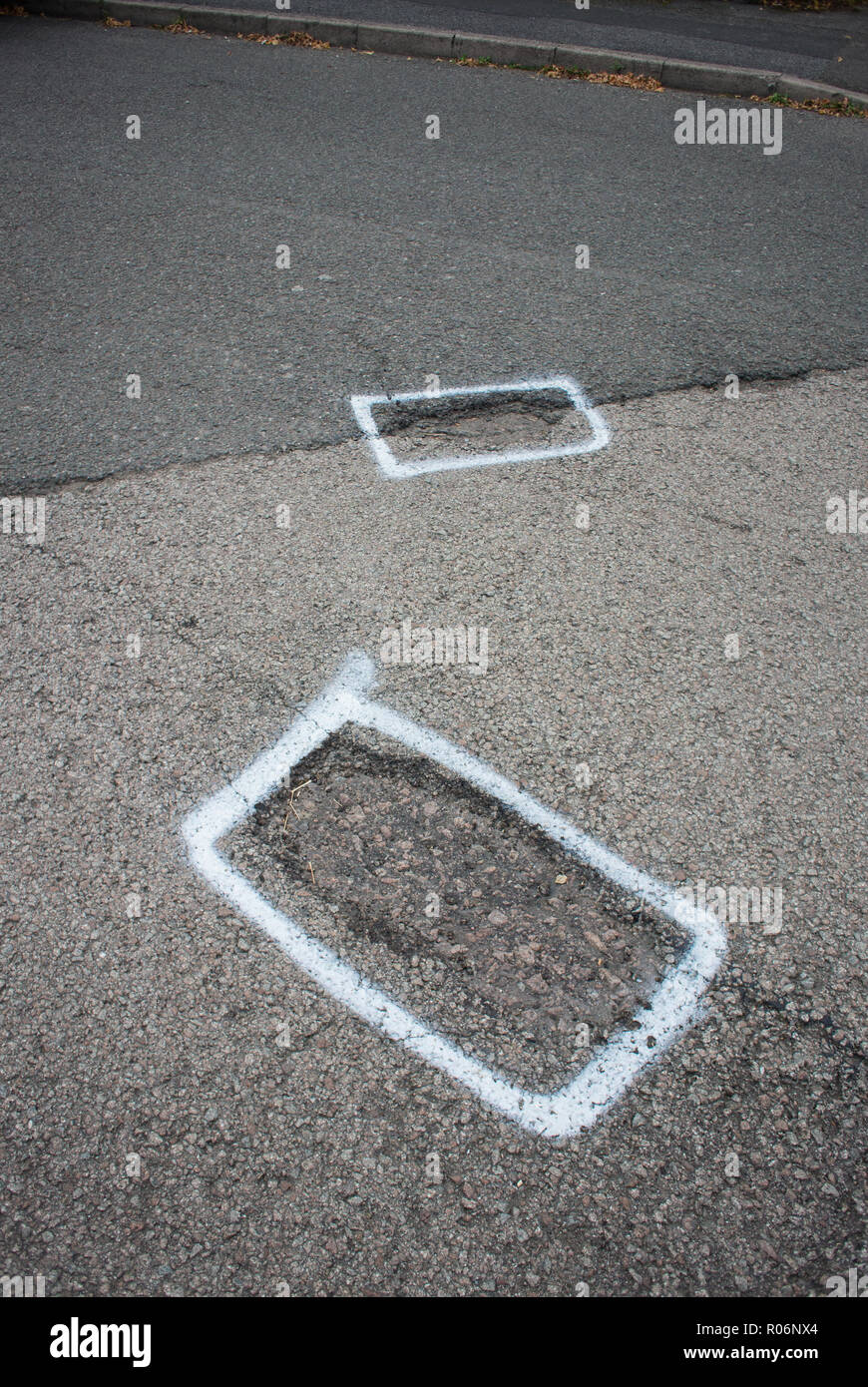 Car damaged by pot hole hi-res stock photography and images - Alamy