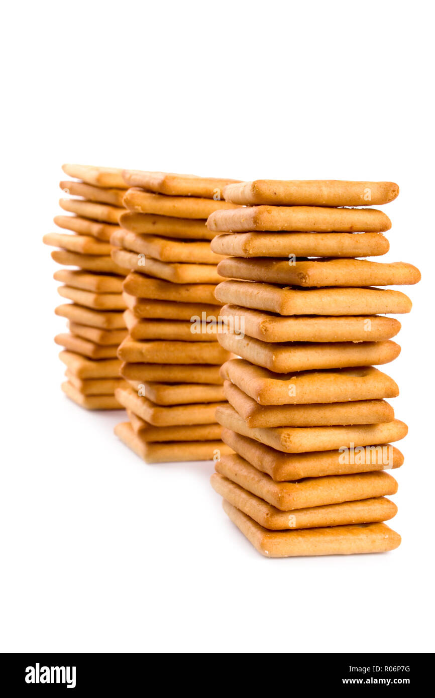 three stacks of cookies isolated on white backgrounds Stock Photo - Alamy