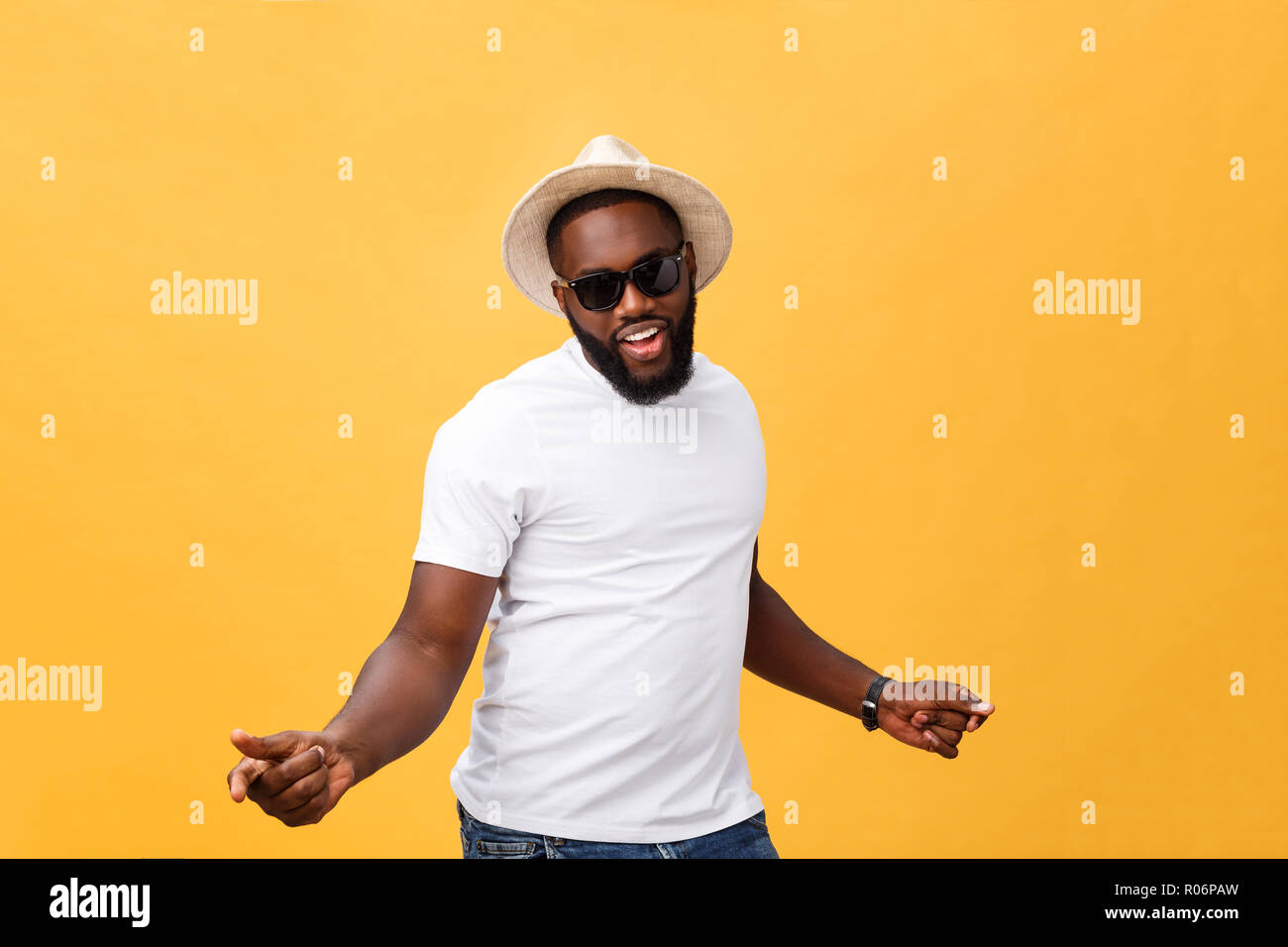 Young black man top dancing isolated on a yellow background Stock Photo ...