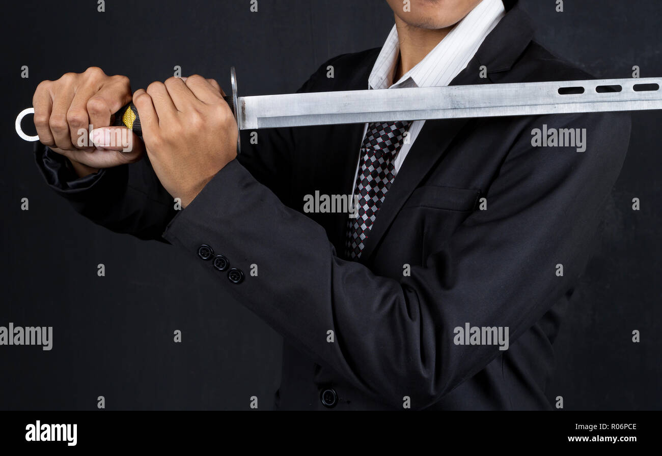 Businessman with sword hi-res stock photography and images - Alamy