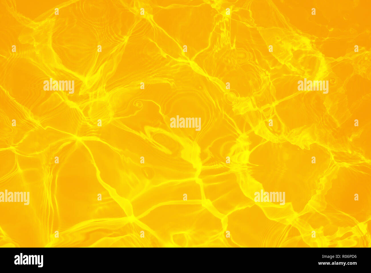 Rippled pattern of clean water in a orange swimming pool for background ...
