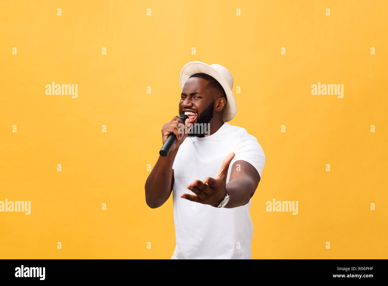 Young teenage black African American boy singer performing at a concert ...