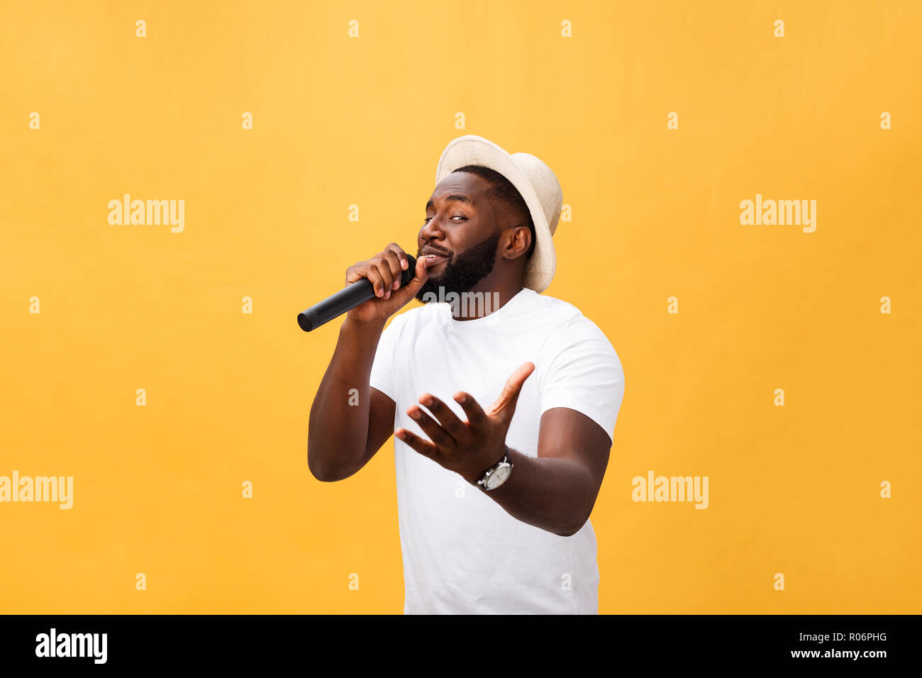 Young teenage black African American boy singer performing at a concert ...