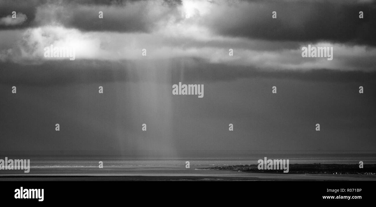Atmospheric squall in black and white over the sea and the Ribble ...