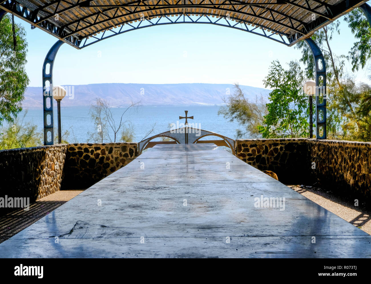 Table and cross at the Church of the Twelve Disciples along the Sea of ...