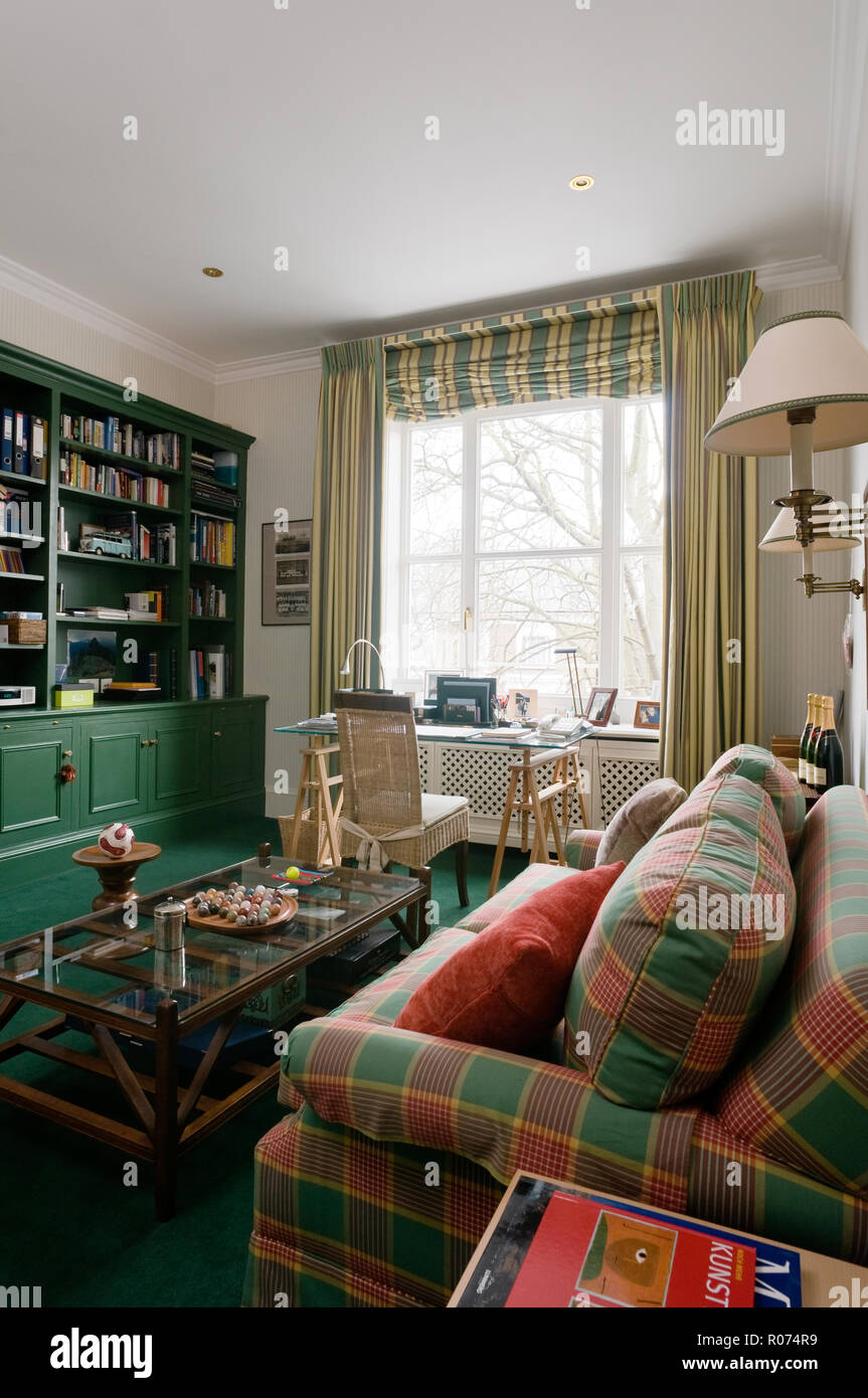 Checked sofa in bedroom Stock Photo - Alamy