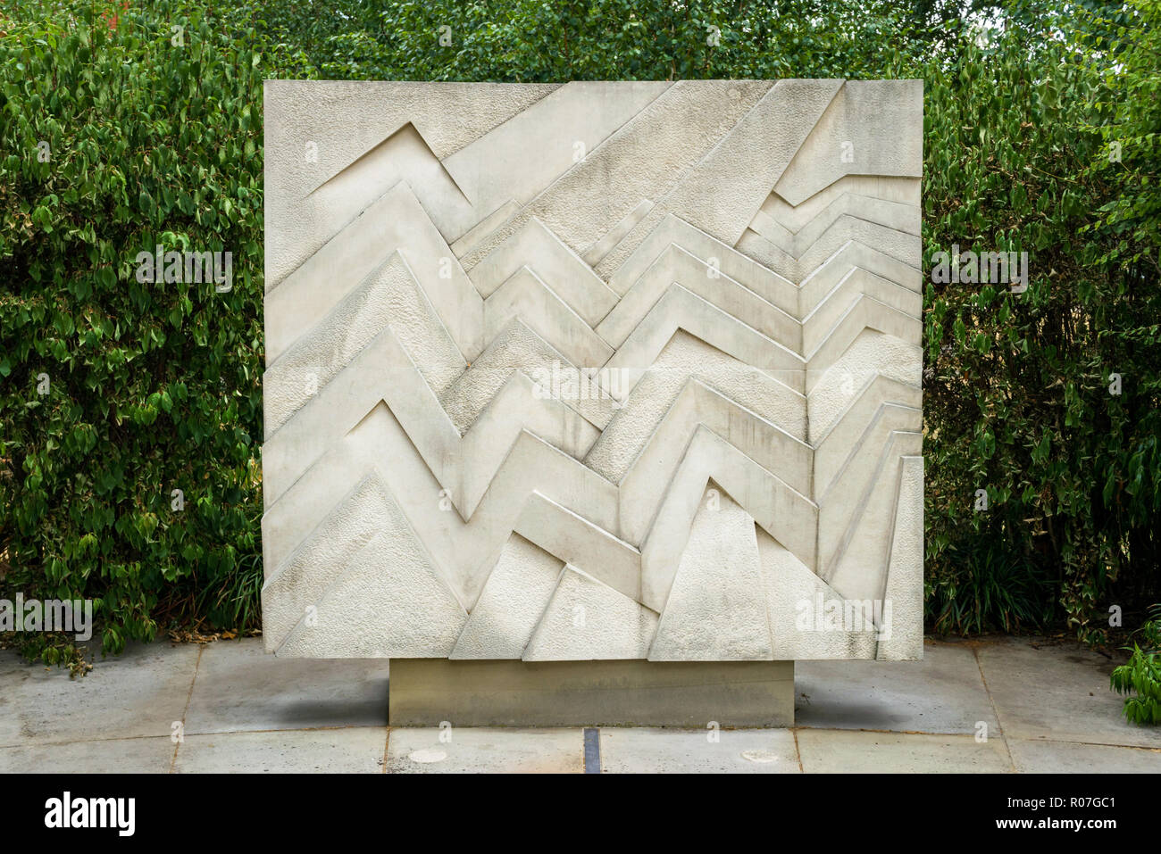 Earth element stone sculpture panel in the Tibetan Peace Garden ...