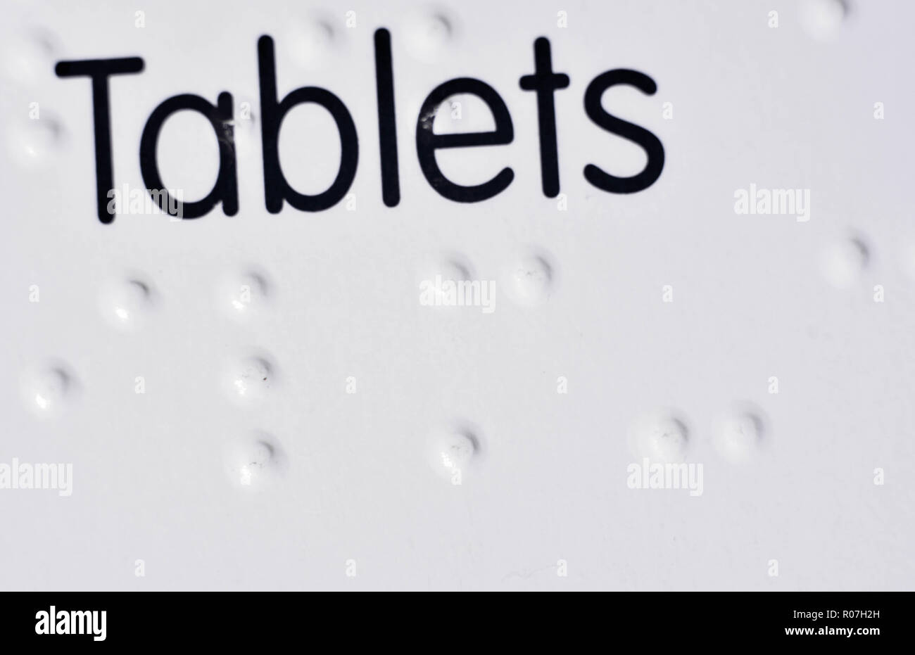tablet text on a box with braille Stock Photo - Alamy