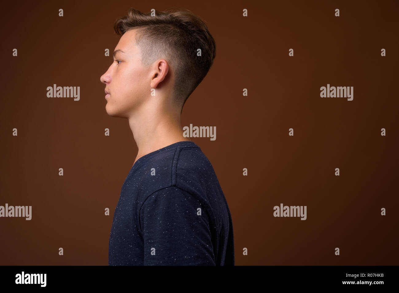 Male teen handsome teen side view hi-res stock photography and images ...