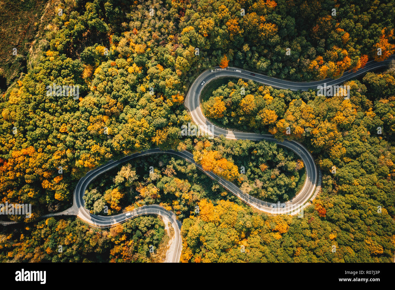 Winding road at sunset hi-res stock photography and images - Alamy