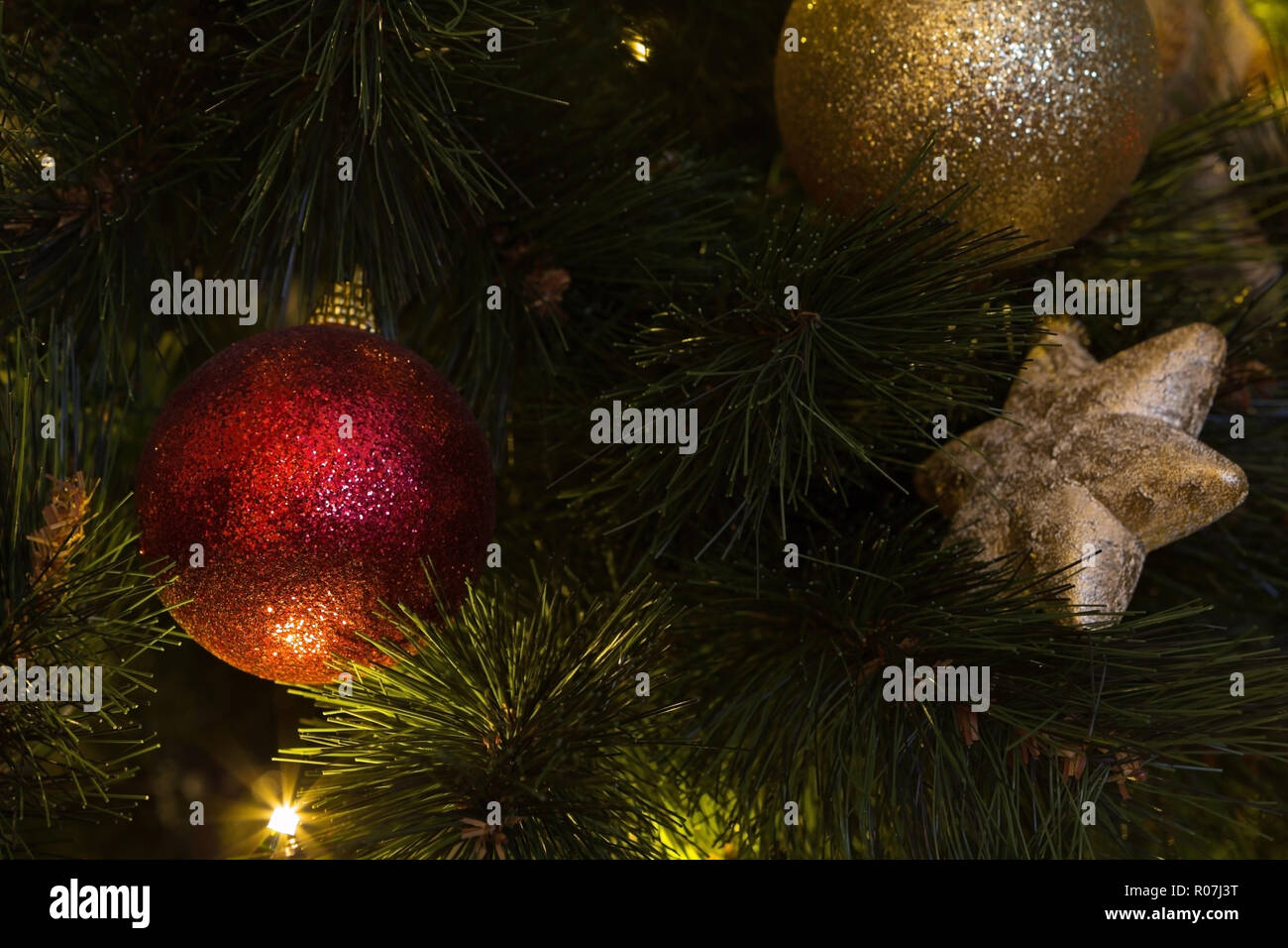 Zoomed View of Fully Decorated and Lit Christmas Tree Stock Photo - Alamy