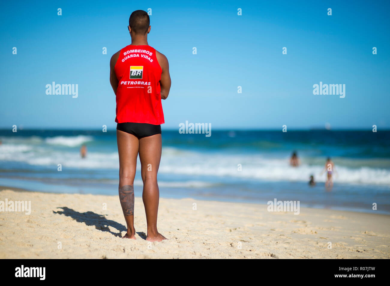 RIO DE JANEIRO - CIRCA FEBRUARY, 2018: A Brazilian lifeguard looks out ...