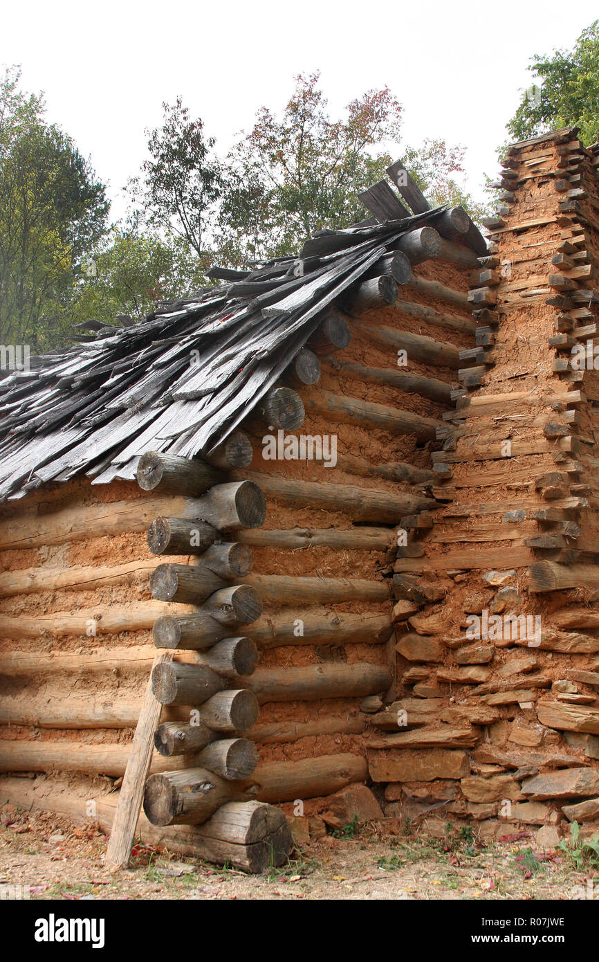 Simple small log house, historical structure from the 1700s displayed ...