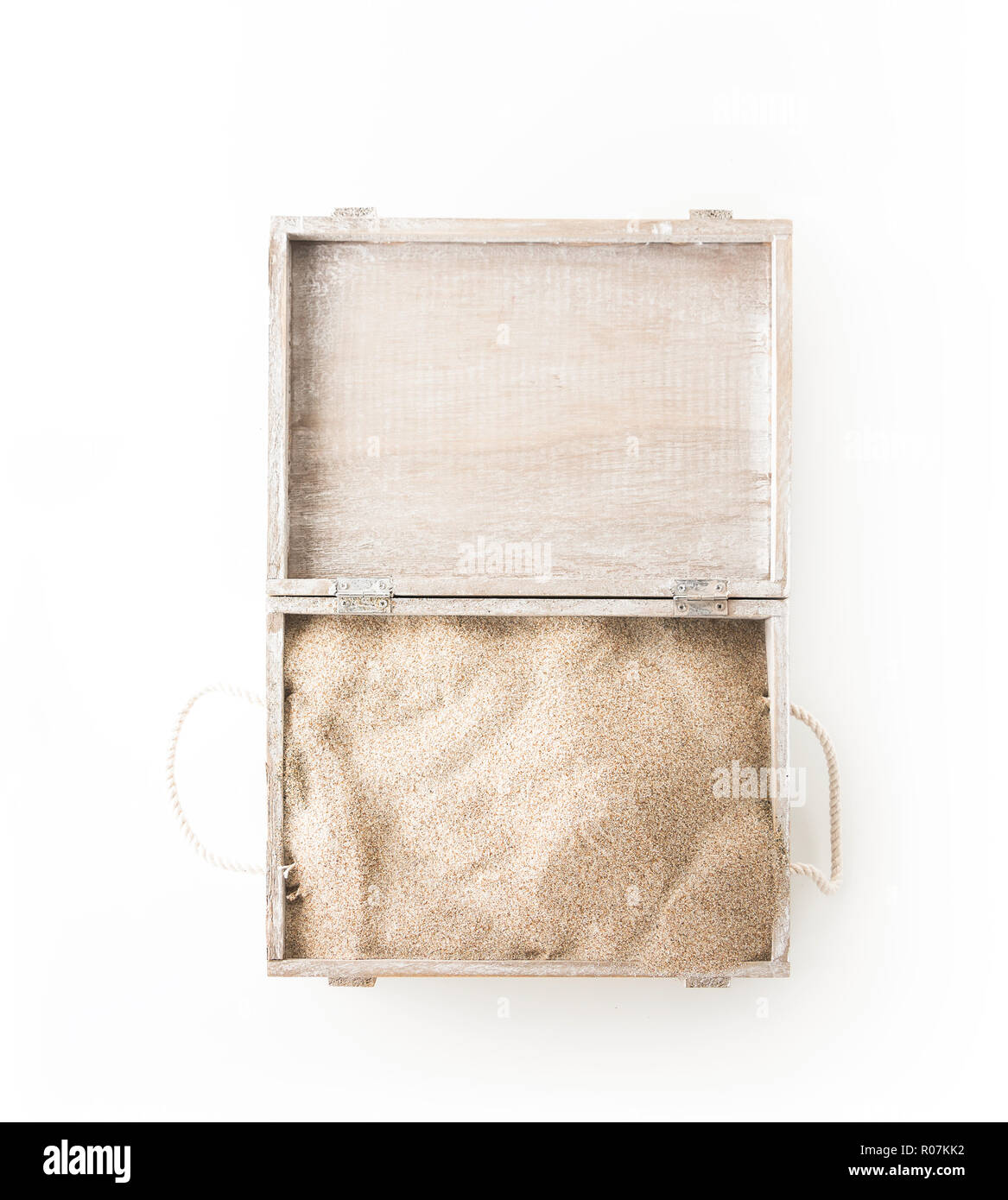 Opened wooden chest full with sand, on white background Stock Photo - Alamy