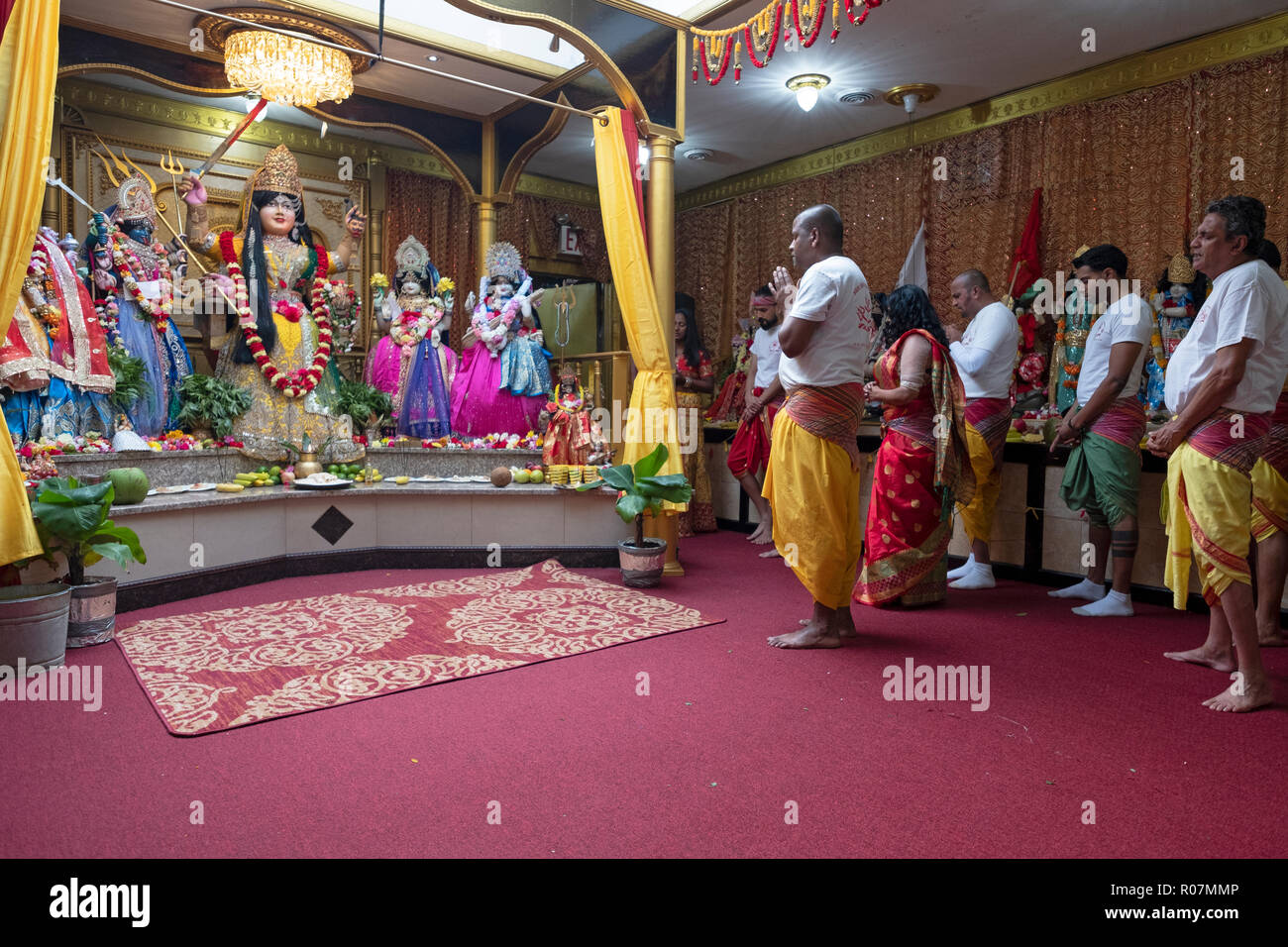 Praying worshiping hi-res stock photography and images - Alamy