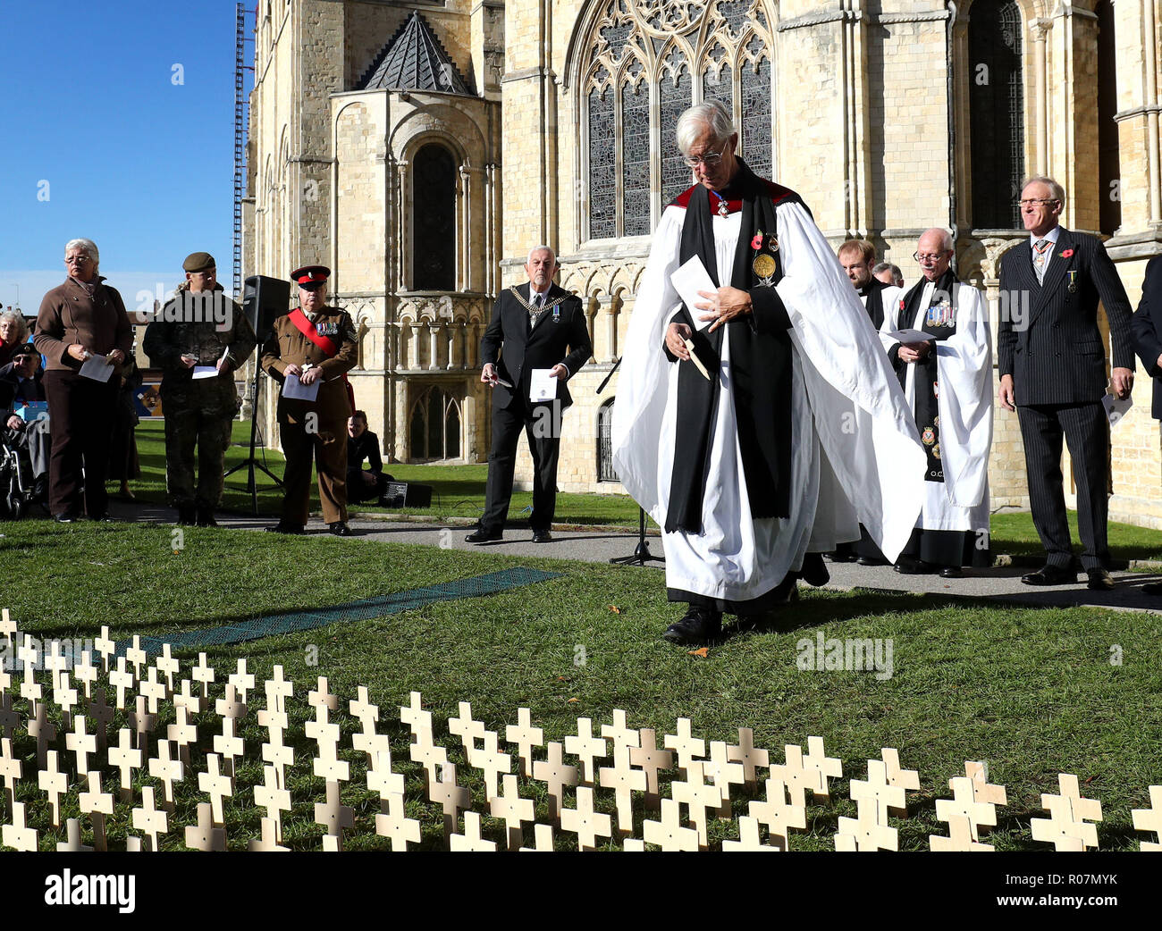The Very Revd Robert Willis, Dean of Canterbury Cathedral, places a ...