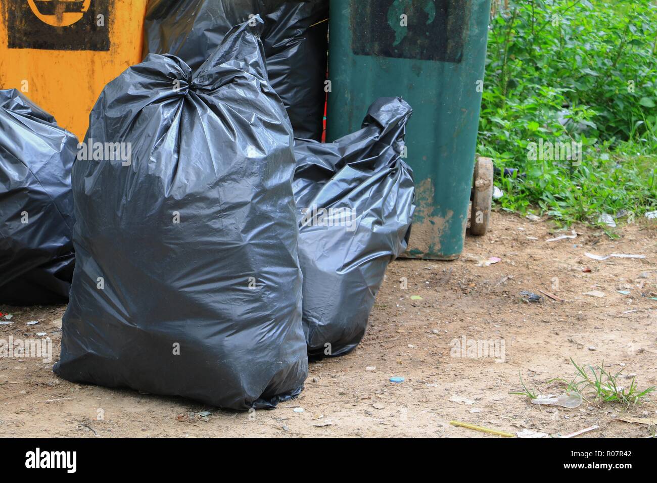 Pile black garbage bag roadside hi-res stock photography and images - Alamy