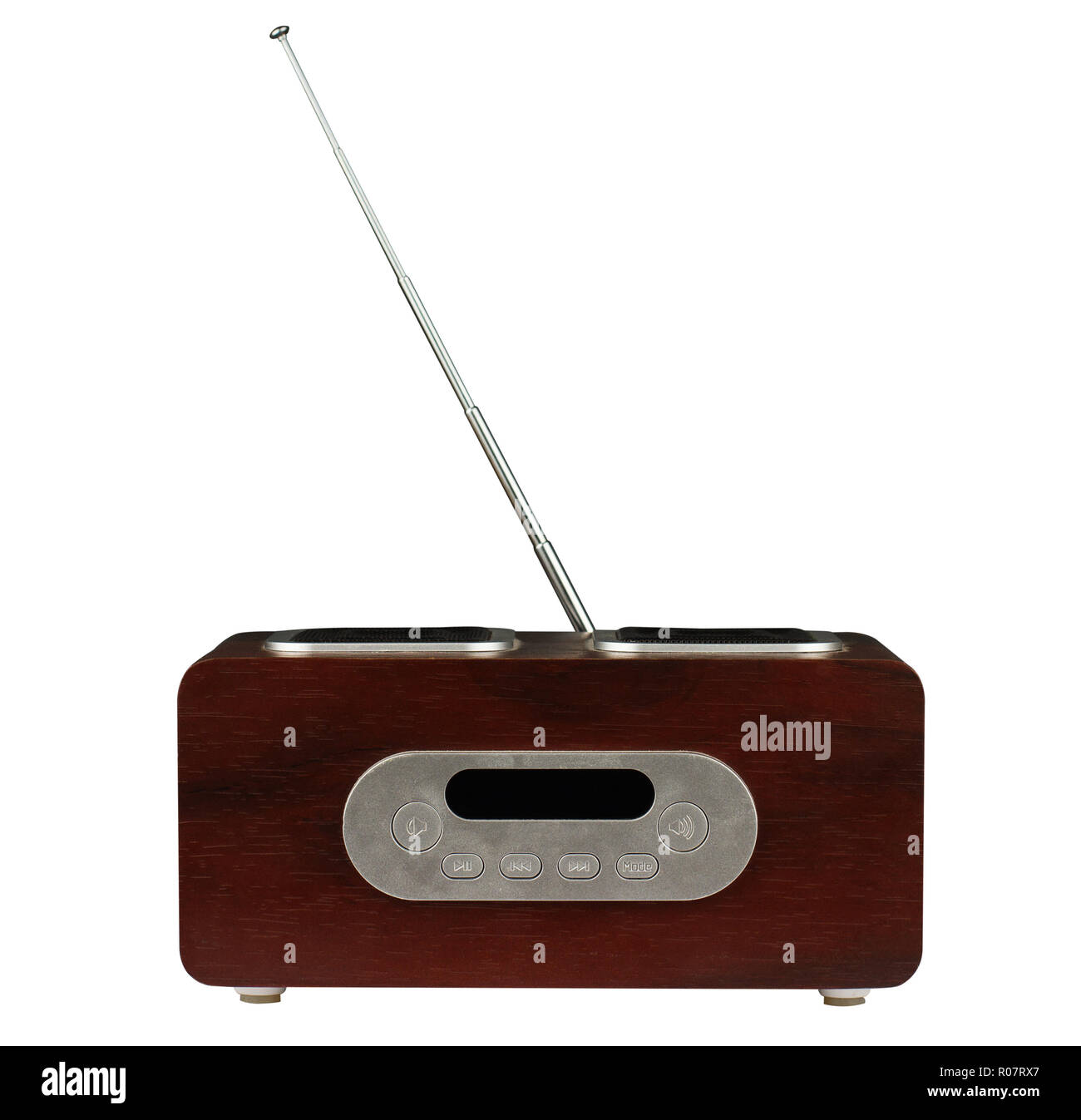 front view of small retro radio with brown wooden finish and metallic ...