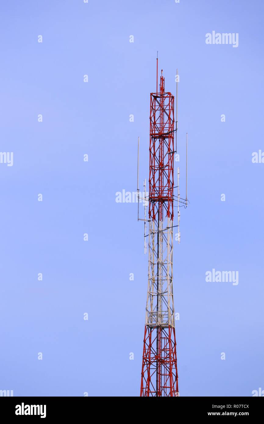 Telecommunication tower red and white antenna radio telephone mobile on ...
