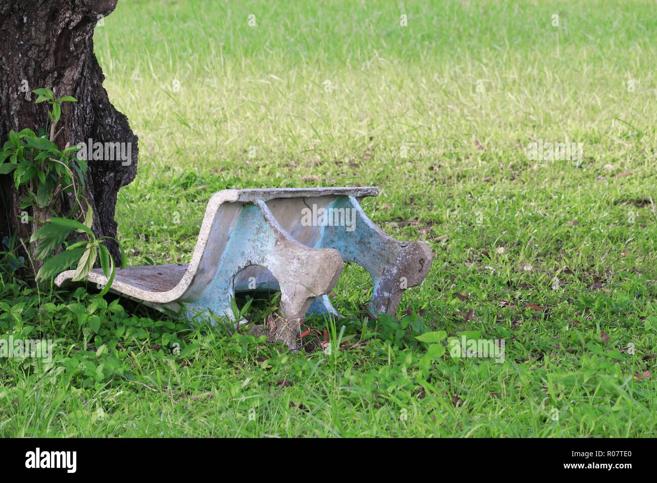 Old polished stone chair in the garden Stock Photo - Alamy