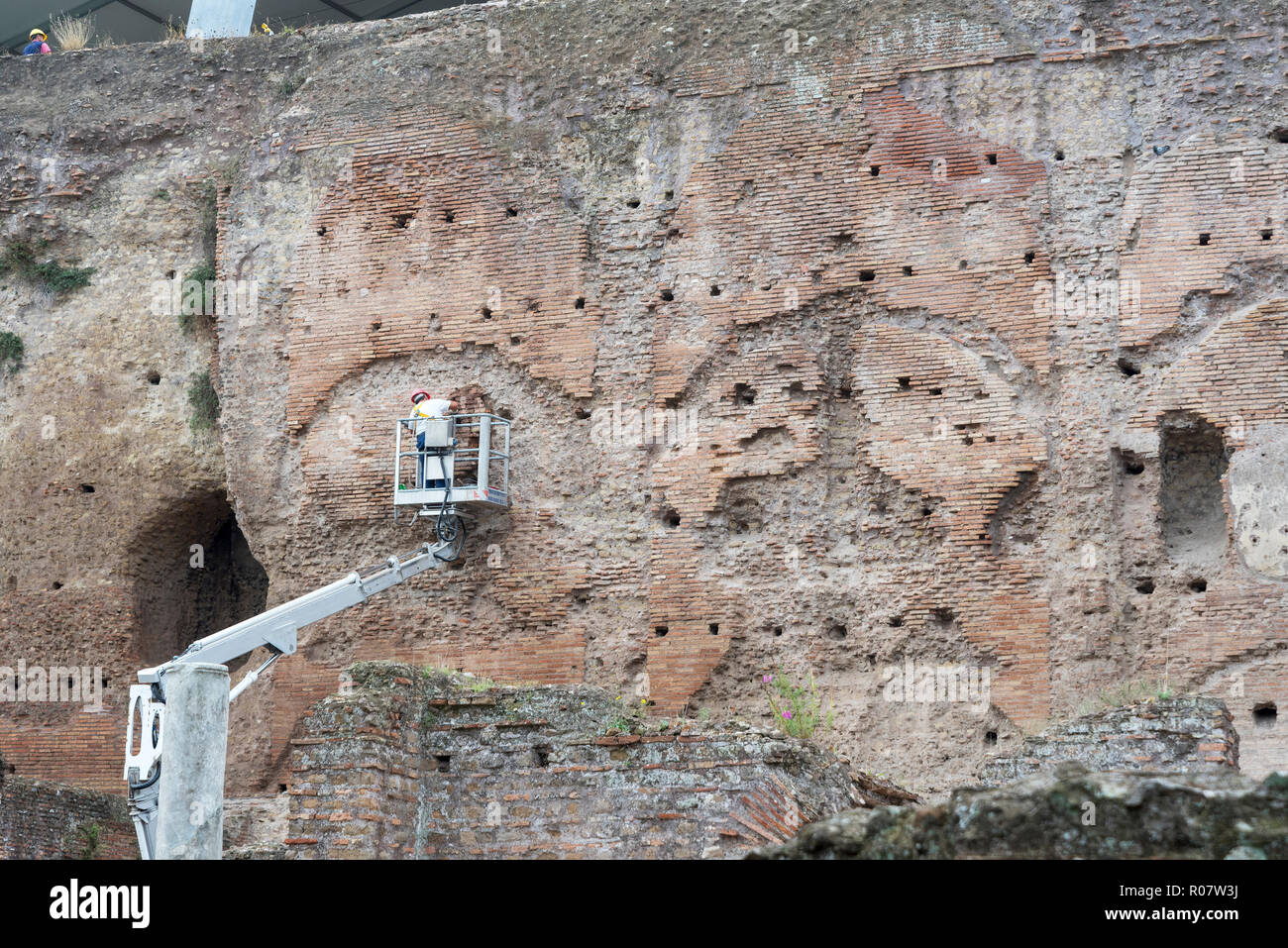 Restorer brick walls, restoration of brick masonry. Restoration of ...