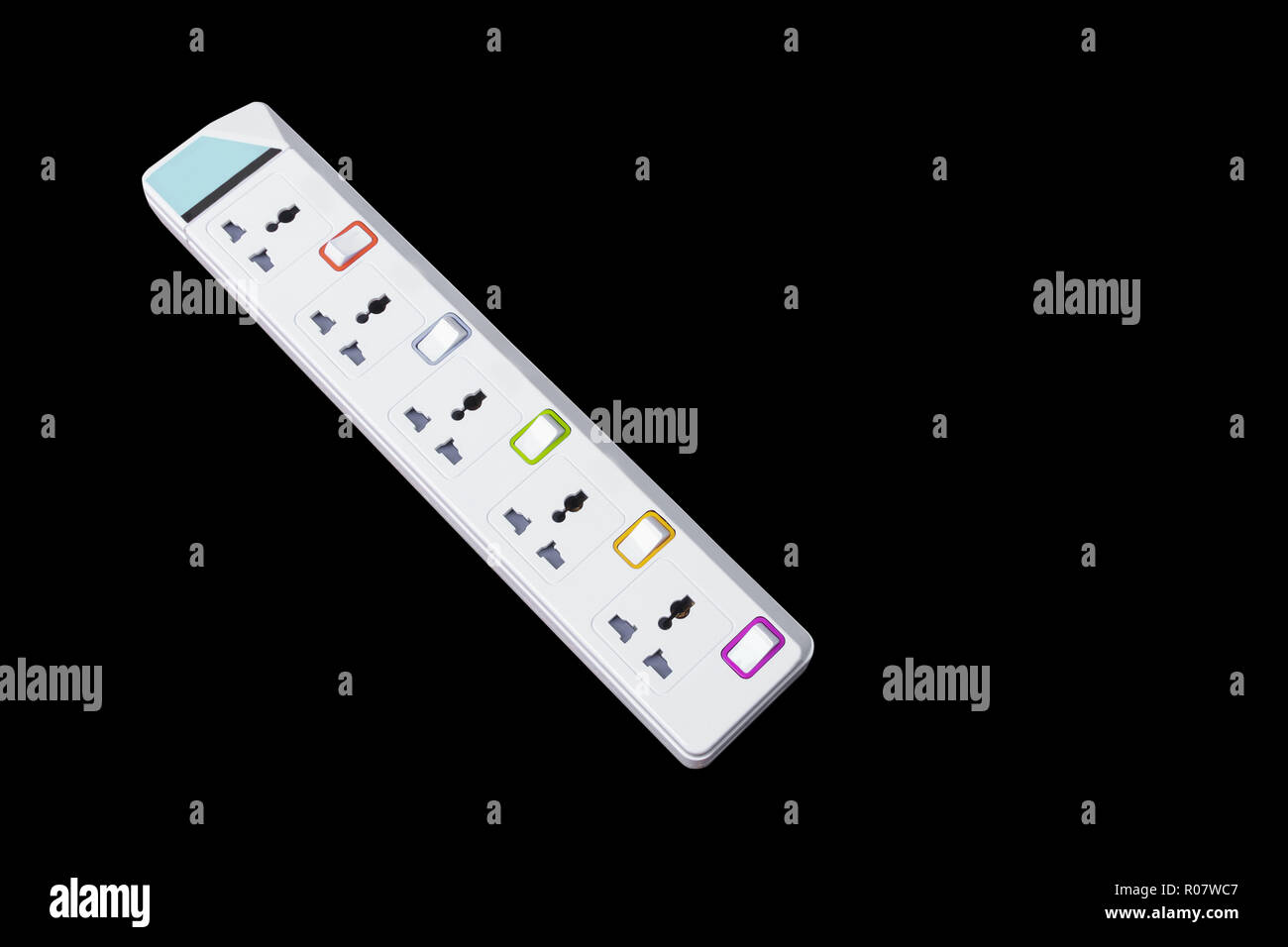 white plug socket electric power bar isolated on black background Stock ...