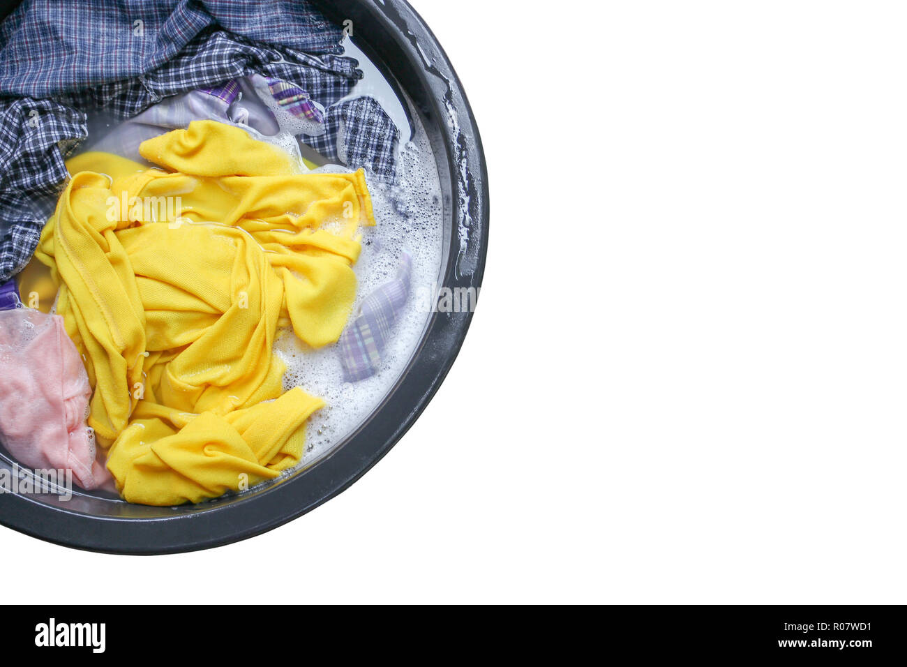 Soak dirty clothes in the basin black for clean isolated on white ...