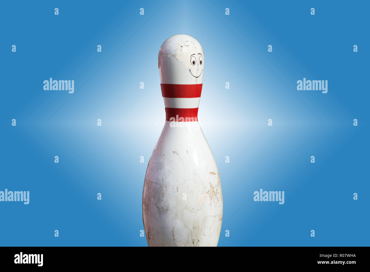 Bowling cone with white and red stripes in front of blue background ...
