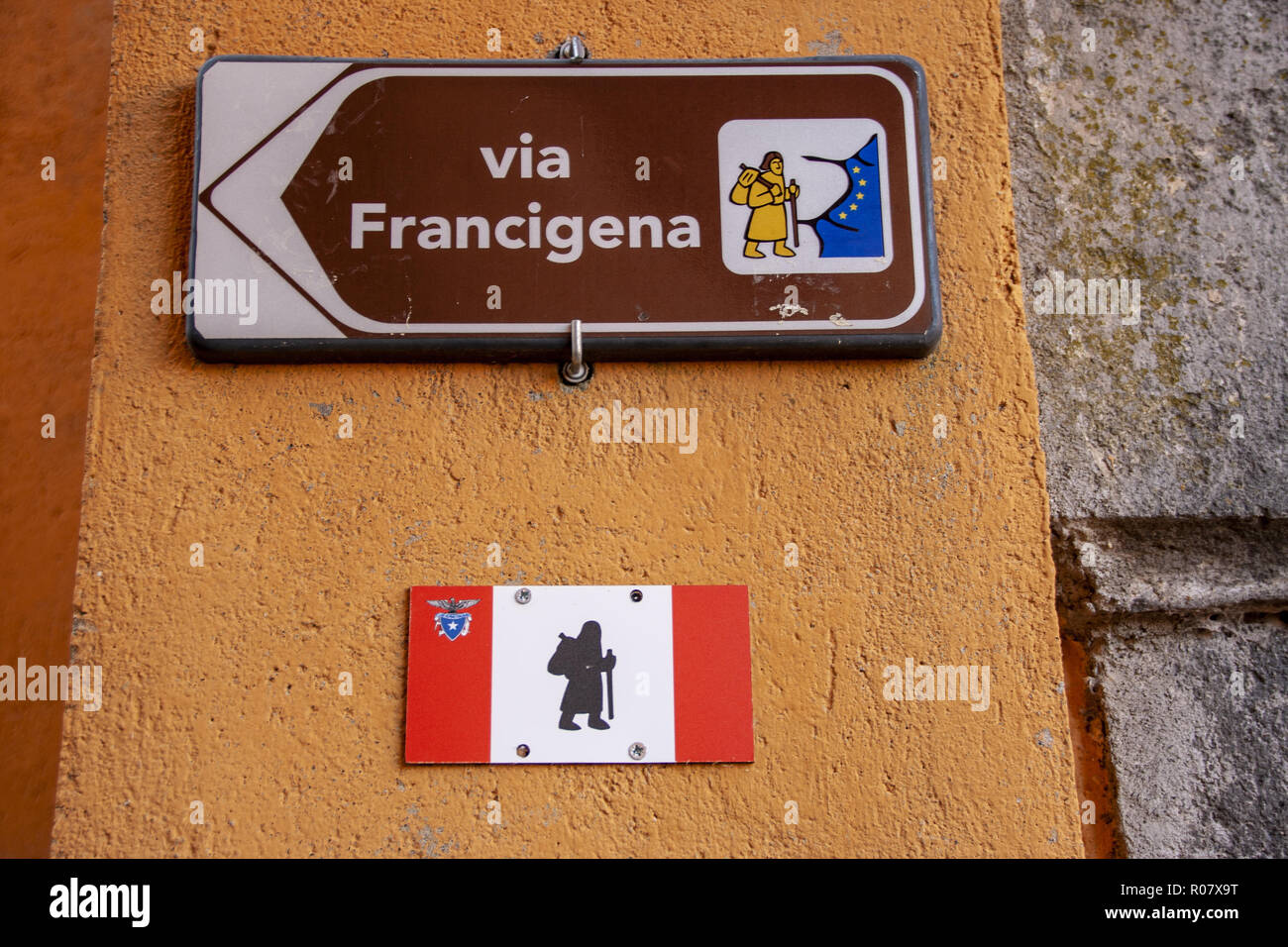 arrow sign of Via Francigena, ancient pilgrimage route through italy ...
