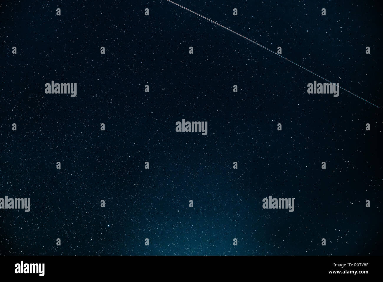 Natural Night Starry Sky. Glowing Stars And Aircraft Light Trail Stock ...